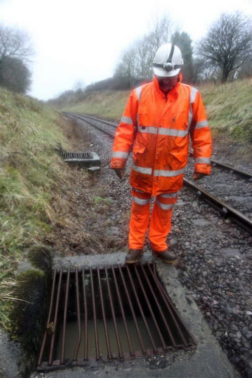 Push to keep lineside drainage systems clear keeps the Swanage Railway ...